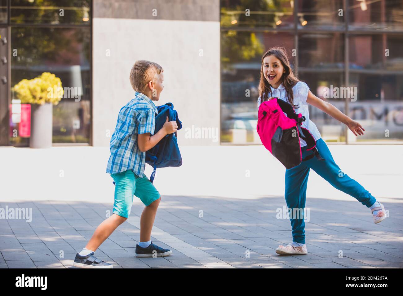 Feeling happy and free after school lessons Stock Photo - Alamy