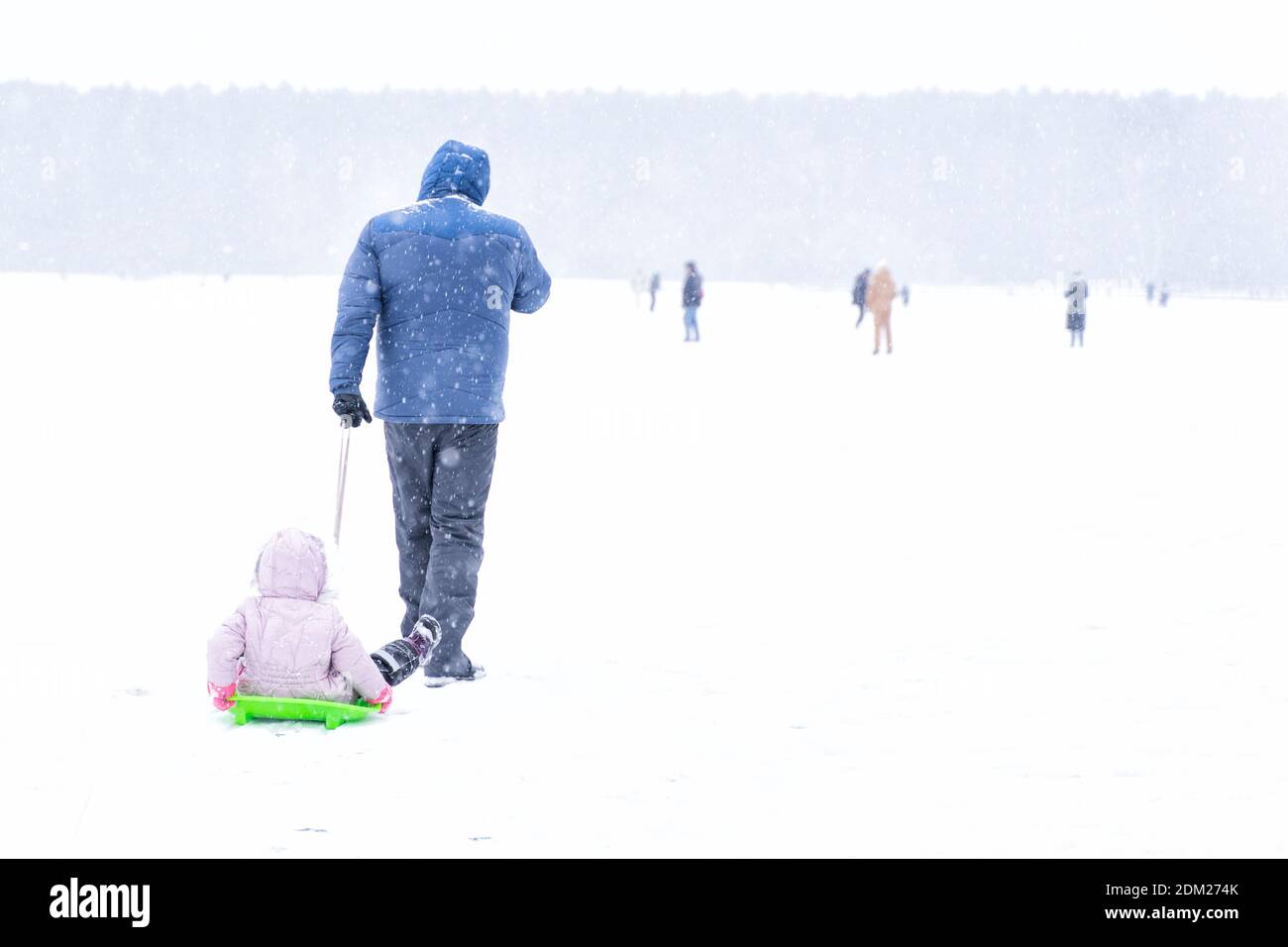 Family winter walk Cut Out Stock Images & Pictures - Alamy