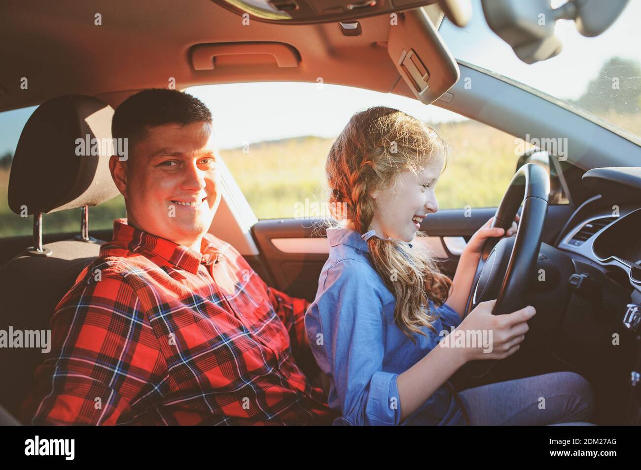 Father teaching daughter driving hi-res stock photography and images ...