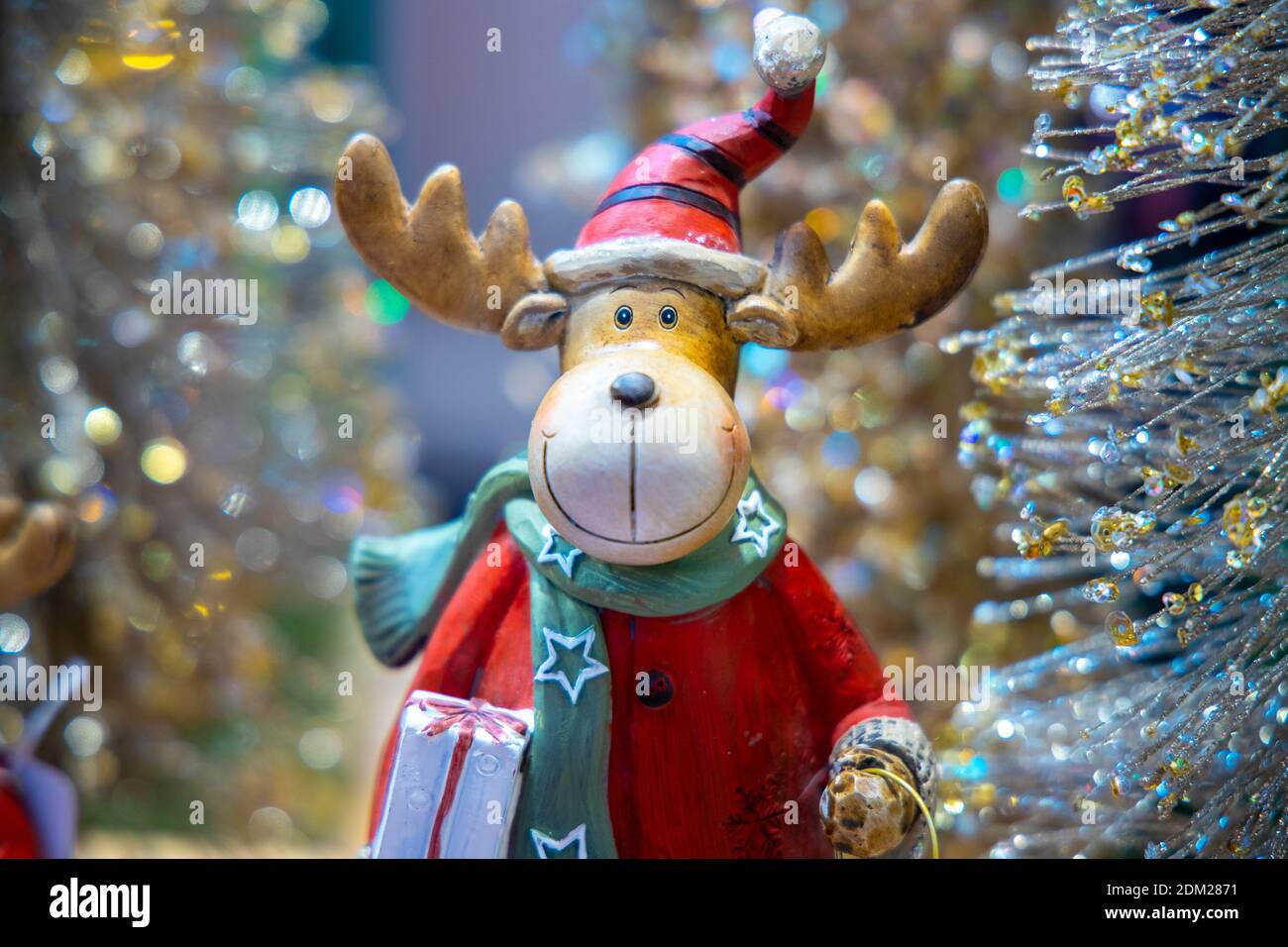 Christmas toy, funny elk under the Christmas tree, template for a New ...