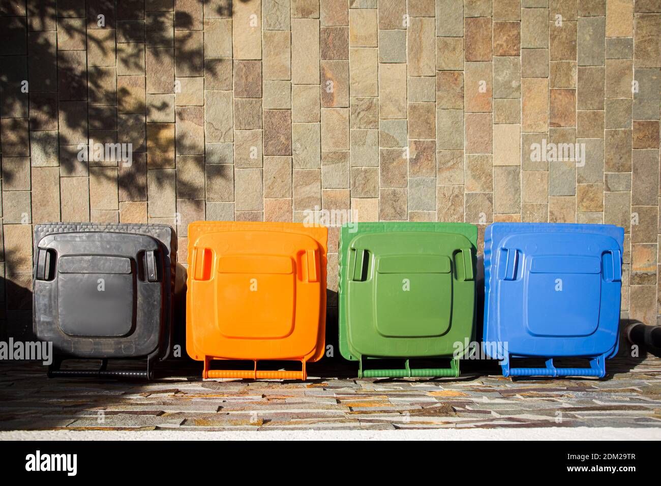 Top view four trash containers on the cement floor Stock Photo - Alamy