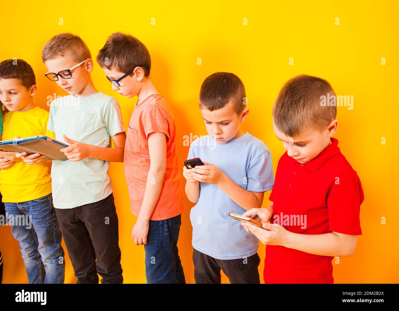 Boys choose their gadgets instead communication with each other Stock ...