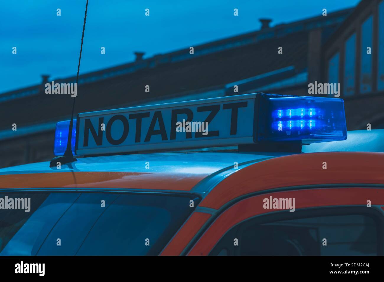 Emergency doctor with blue light, blue light with lettering emergency ...