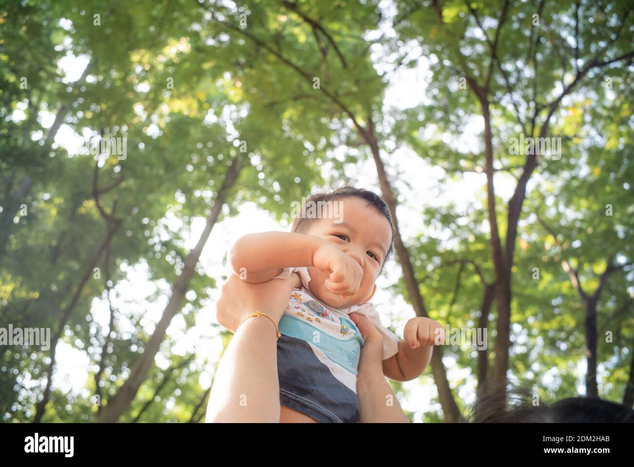 Asian baby girl smile lift hi-res stock photography and images - Alamy