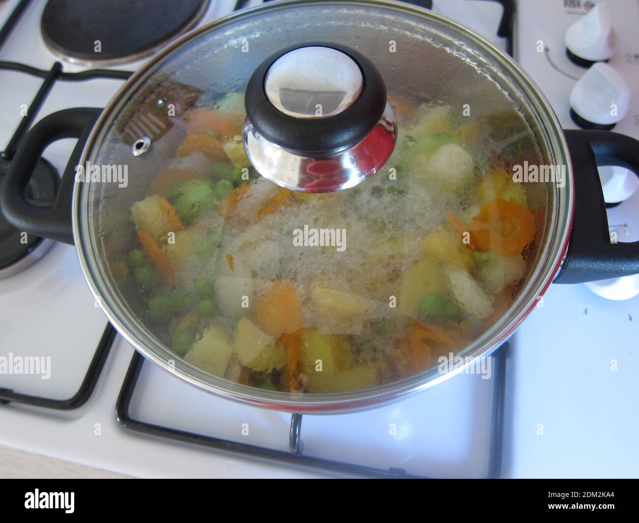 Vegetable pot cooking in a pan Stock Photo - Alamy