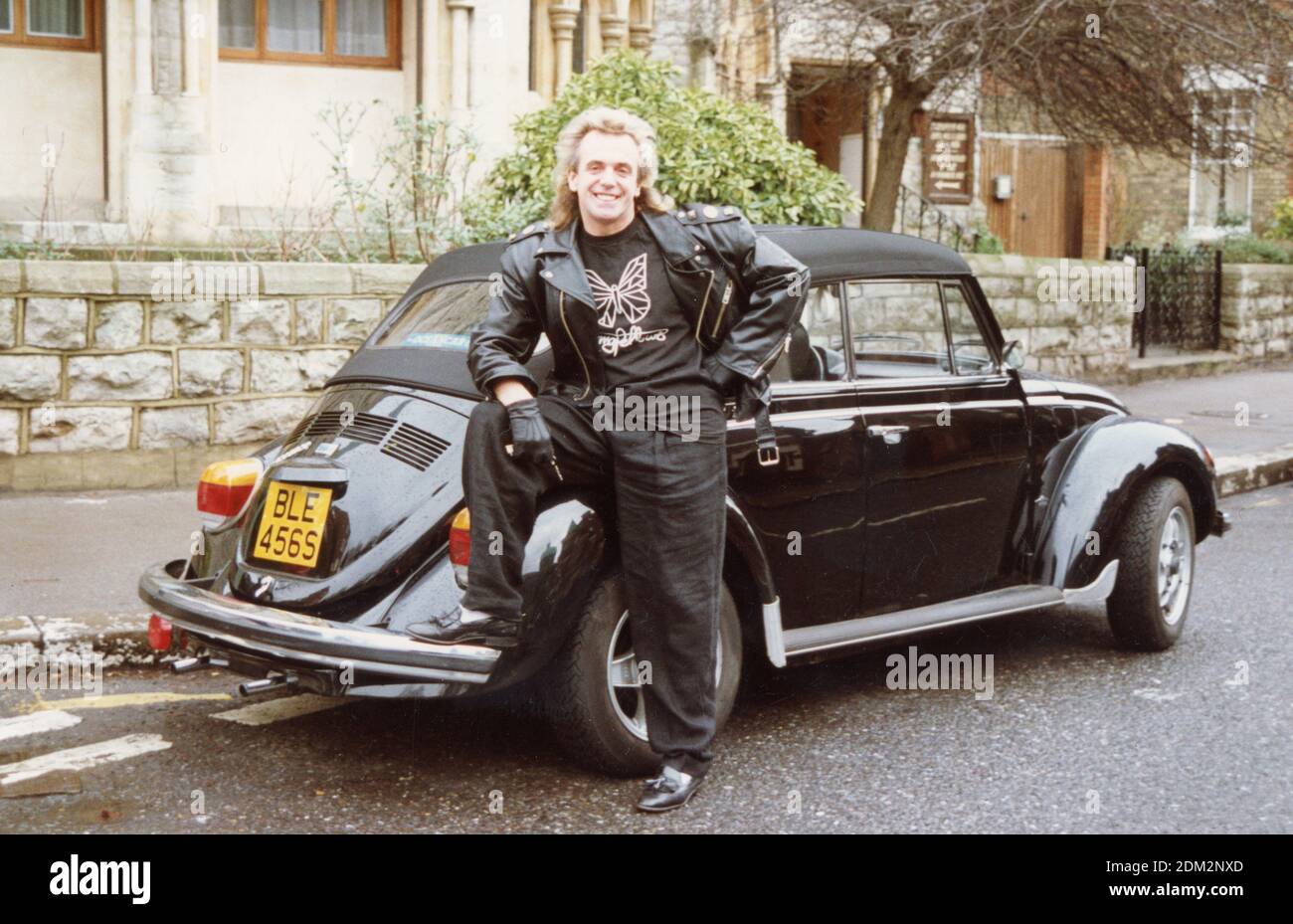 London, UK. LIBRARY. Peter Stringfellow with his black VW Beetle. Late ...