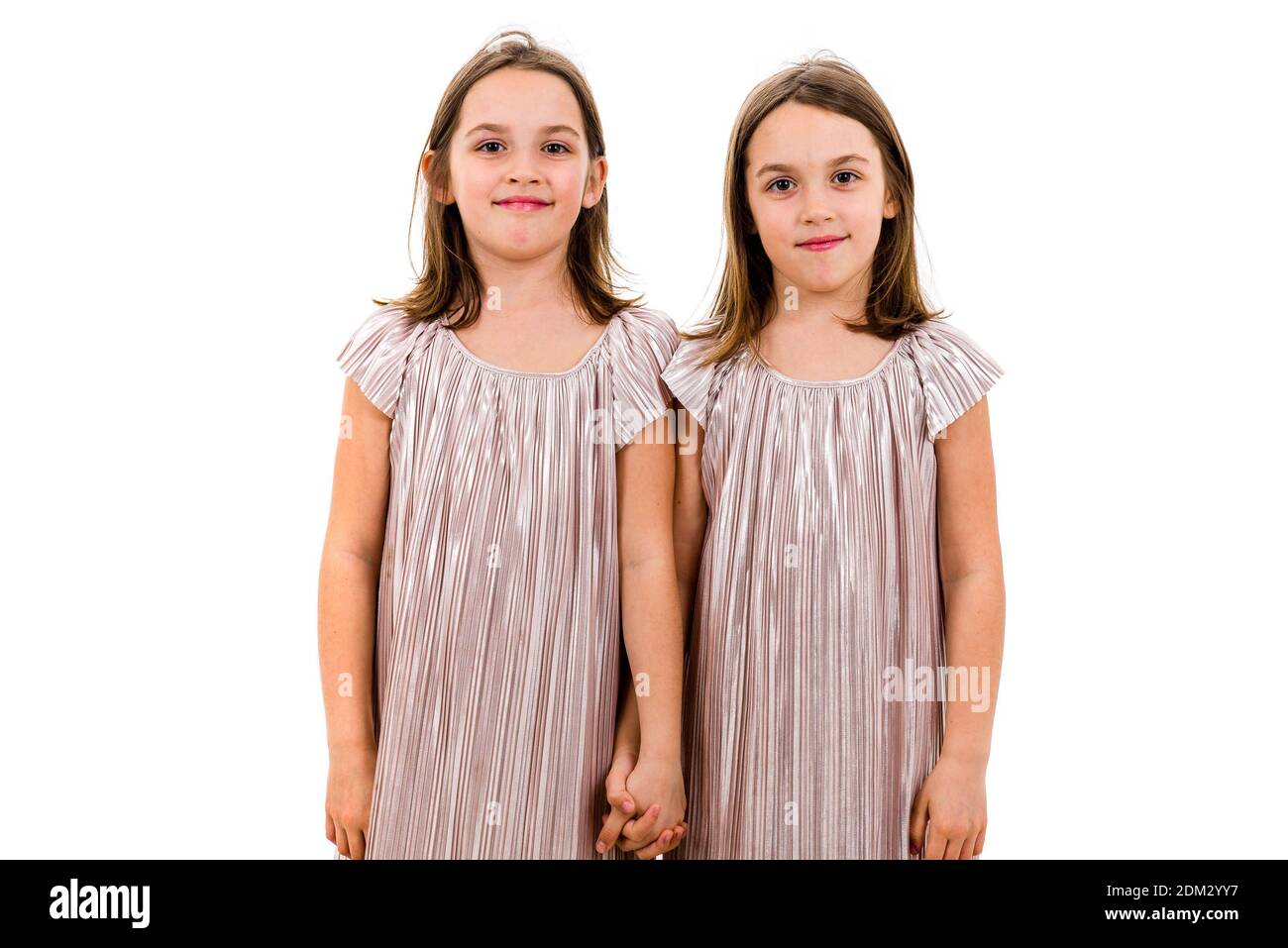 Twin Girls Holding Hands High Resolution Stock Photography and Images ...