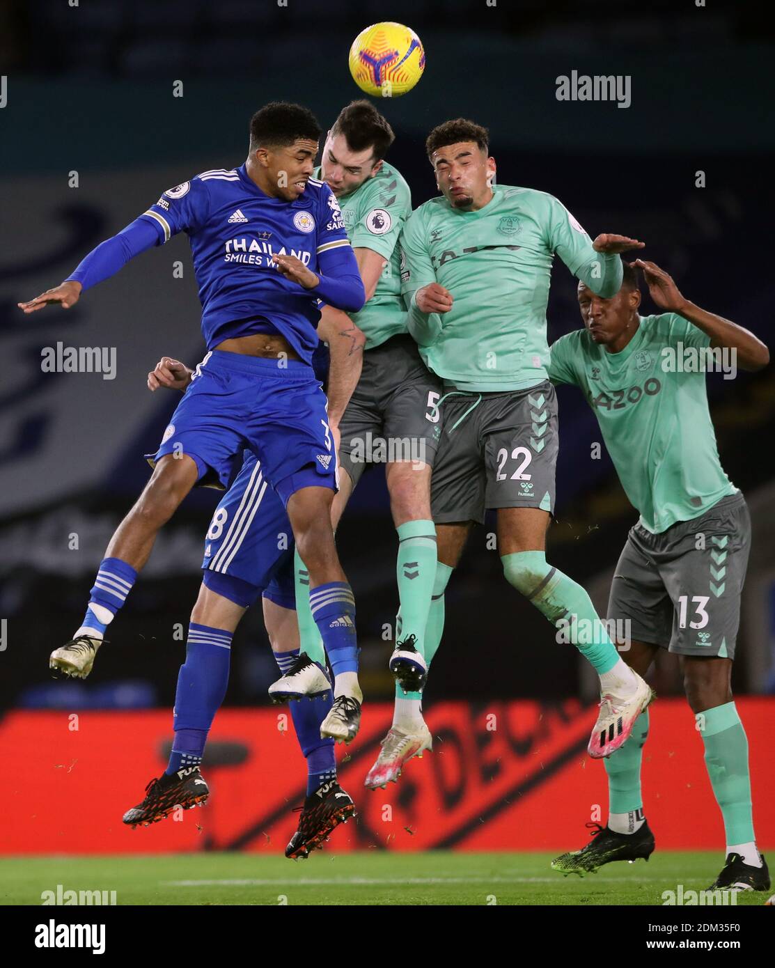 Leicester City's Wesley Fofana (left) challenges in the air with ...