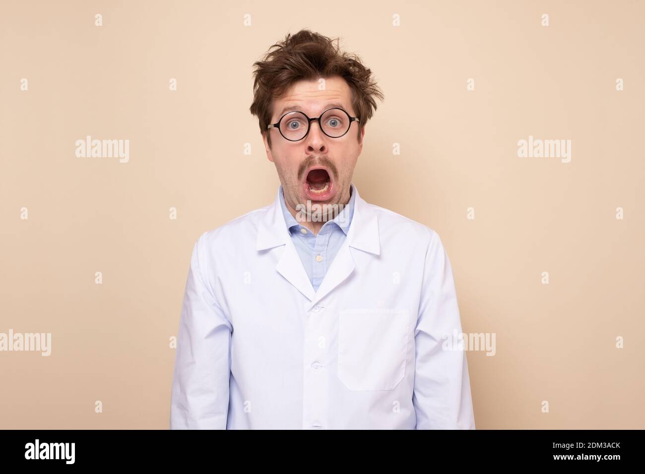 Male scientist got shocked and surprised with news. Studio shot Stock ...