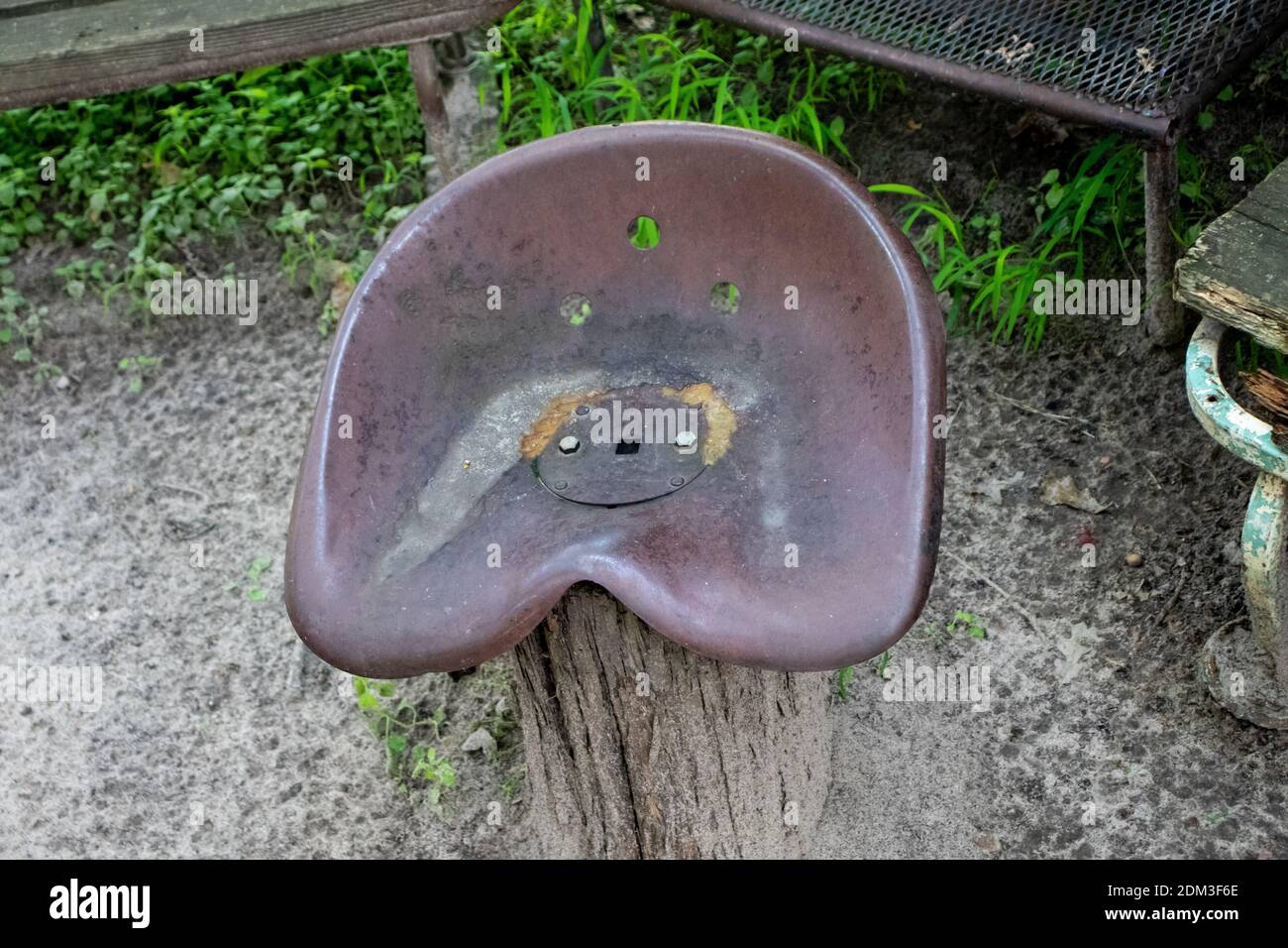 Old Rustic Tractor seat made in to a chair . High quality photo Stock ...