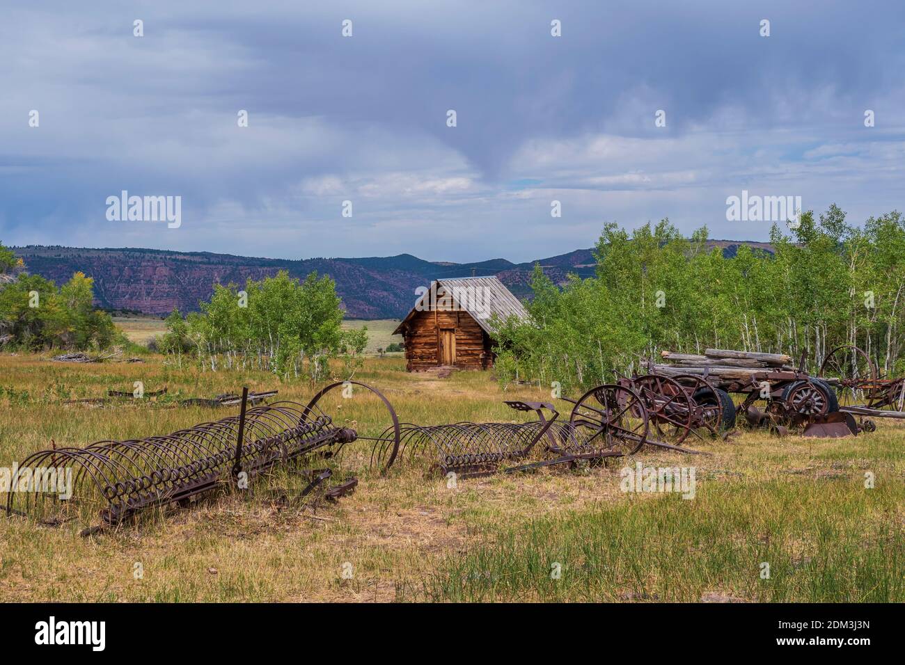 Old farm equipment and the milking barn, Swett Ranch National Historic ...