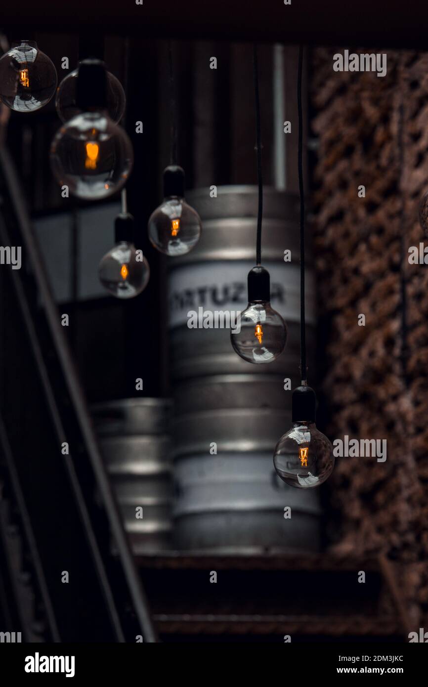 Focus shot hanging light bulbs hi-res stock photography and images - Alamy