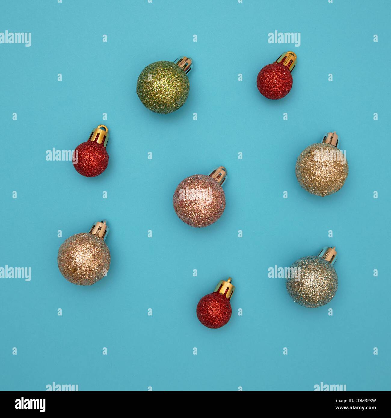 red christmas ball patterns on solid blue background. Balls of ...