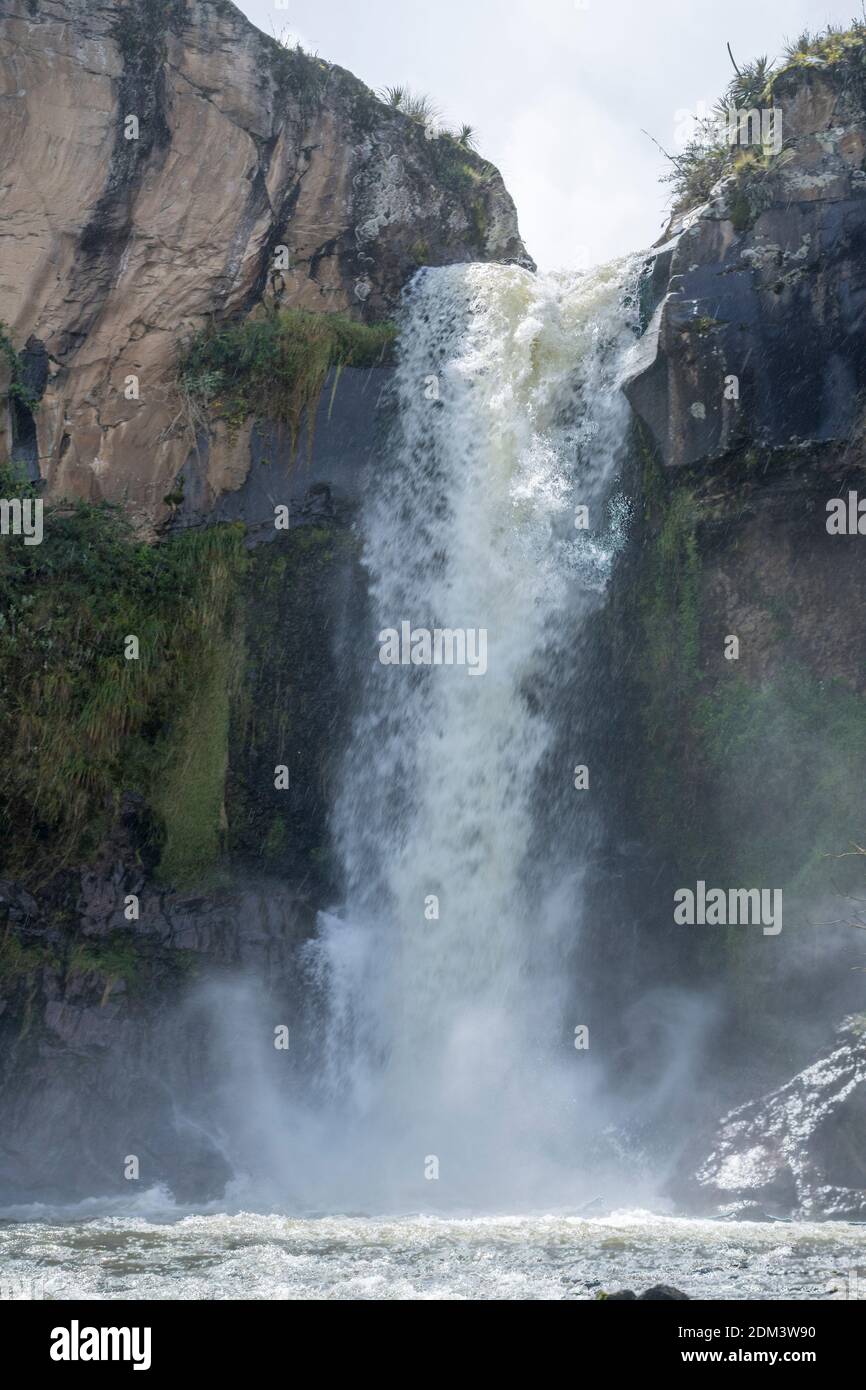 Waterfall in the Rio Pita Valley near Cotopaxi Volcano running off a ...