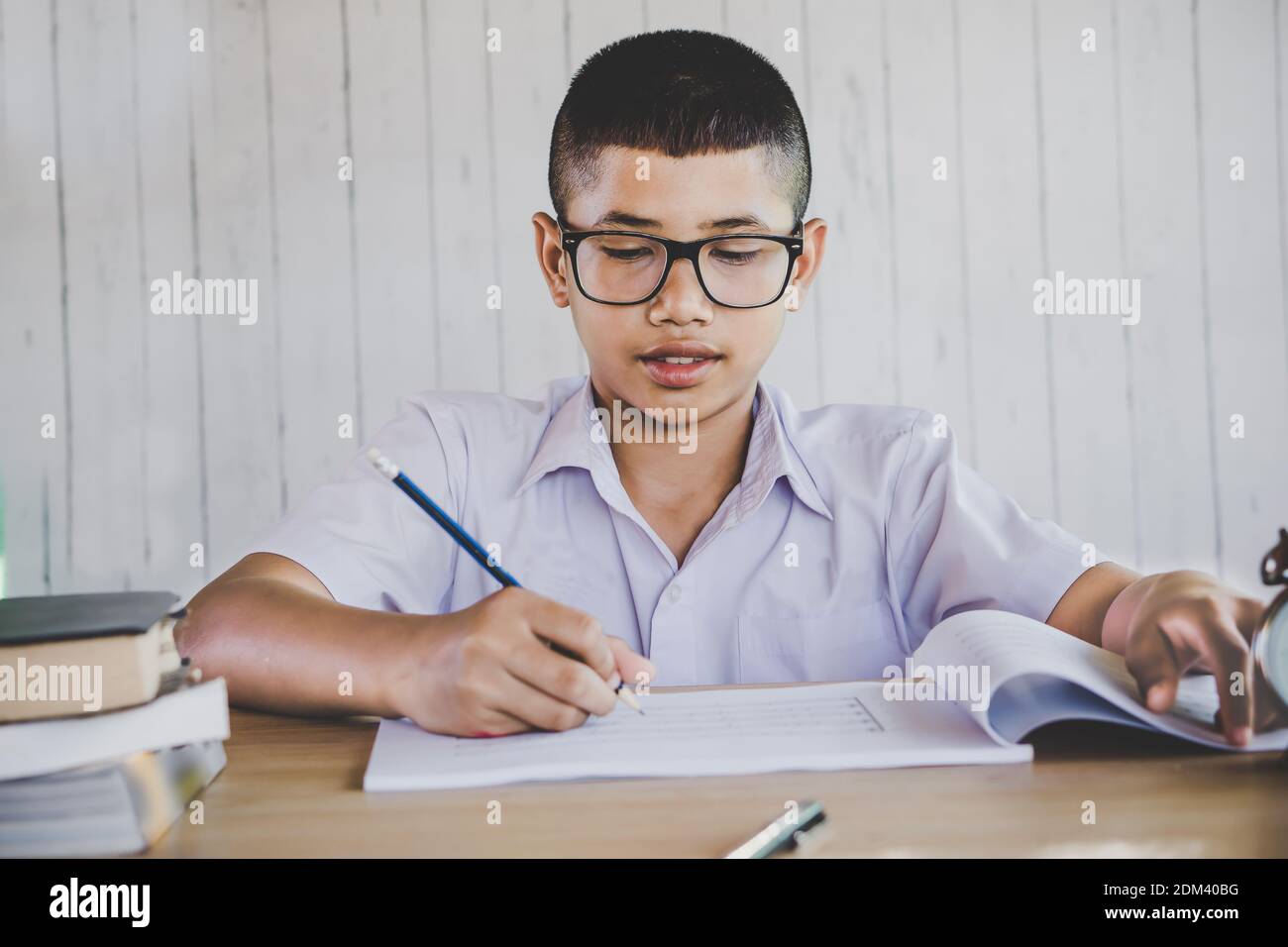 Indian boys school writing hi-res stock photography and images - Alamy