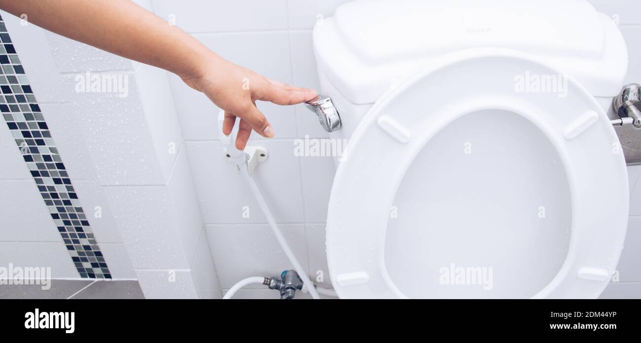 Hand flushing hi-res stock photography and images - Alamy