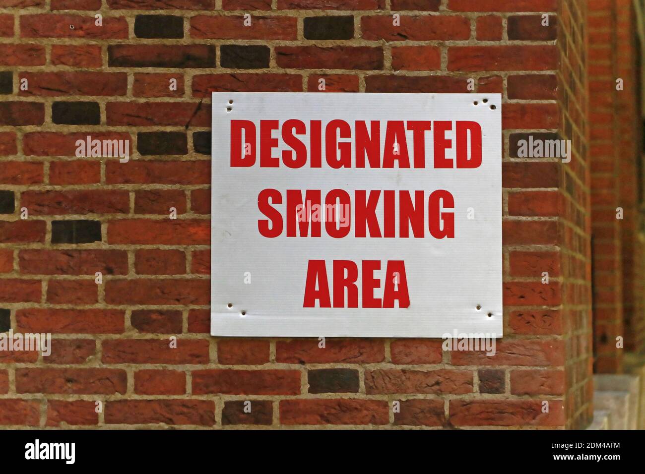 Designated Smoking Area Information Sign at Building Corner Stock Photo ...