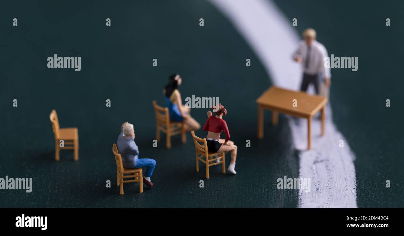 The miniature sculptures of students in a classroom Stock Photo - Alamy