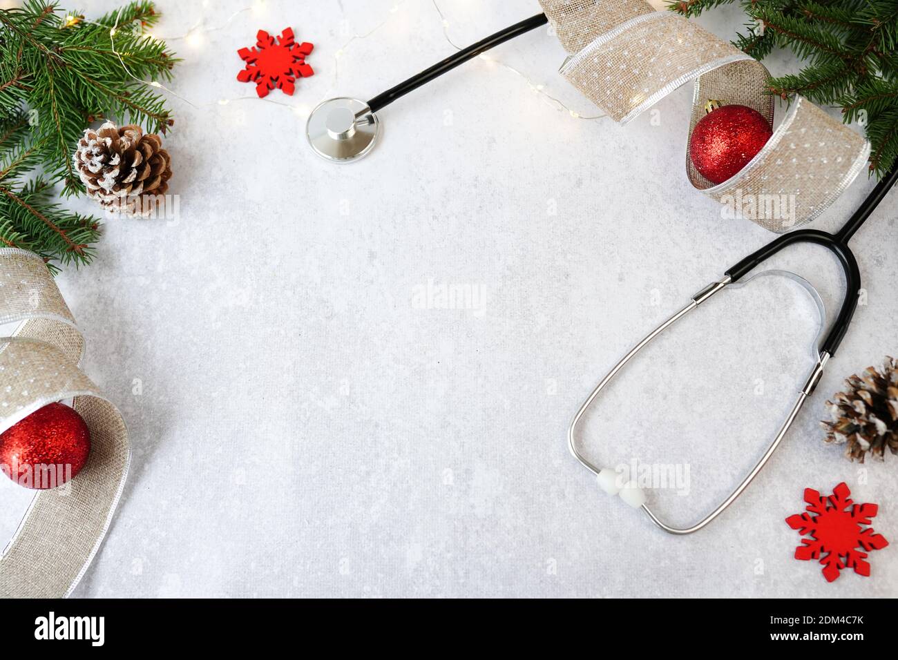 Medical Christmas and New Year. Stethoscope and red christmas ...