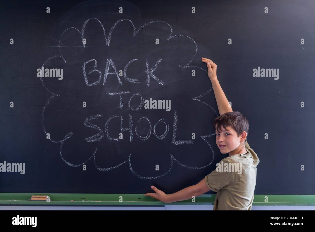 School boys side by side back view hi-res stock photography and images ...