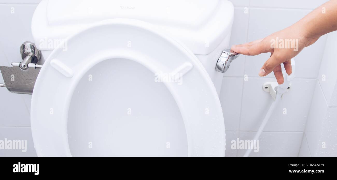 Hand flushing hi-res stock photography and images - Alamy
