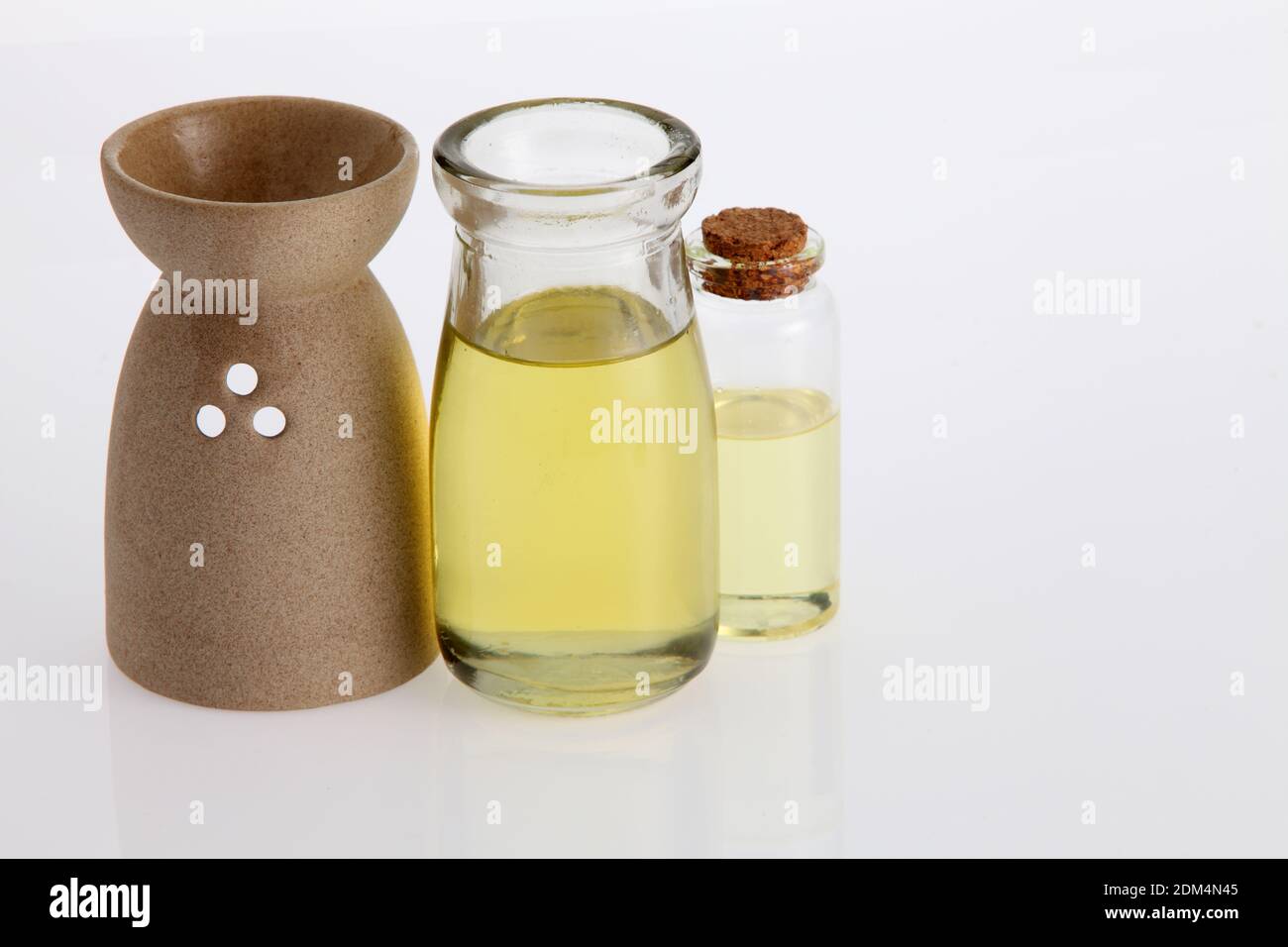 Massage Oil In Glass Containers Against White Background Stock Photo ...