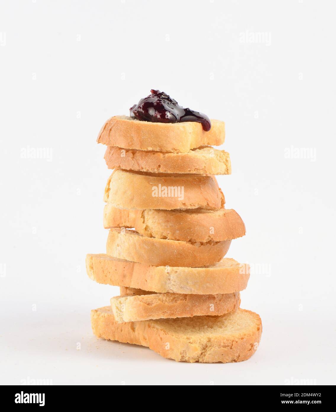 Stack of wheat rusks with jam isolated on white background Stock Photo ...