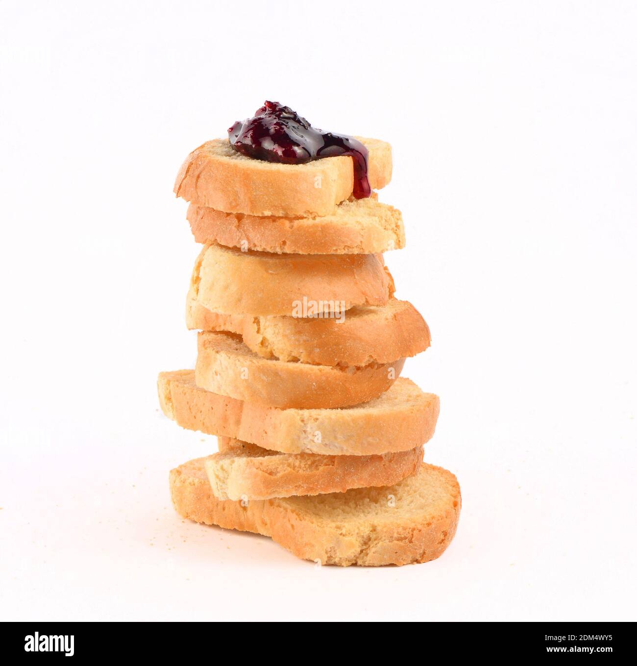 Stack of wheat rusks with jam isolated on white background Stock Photo ...