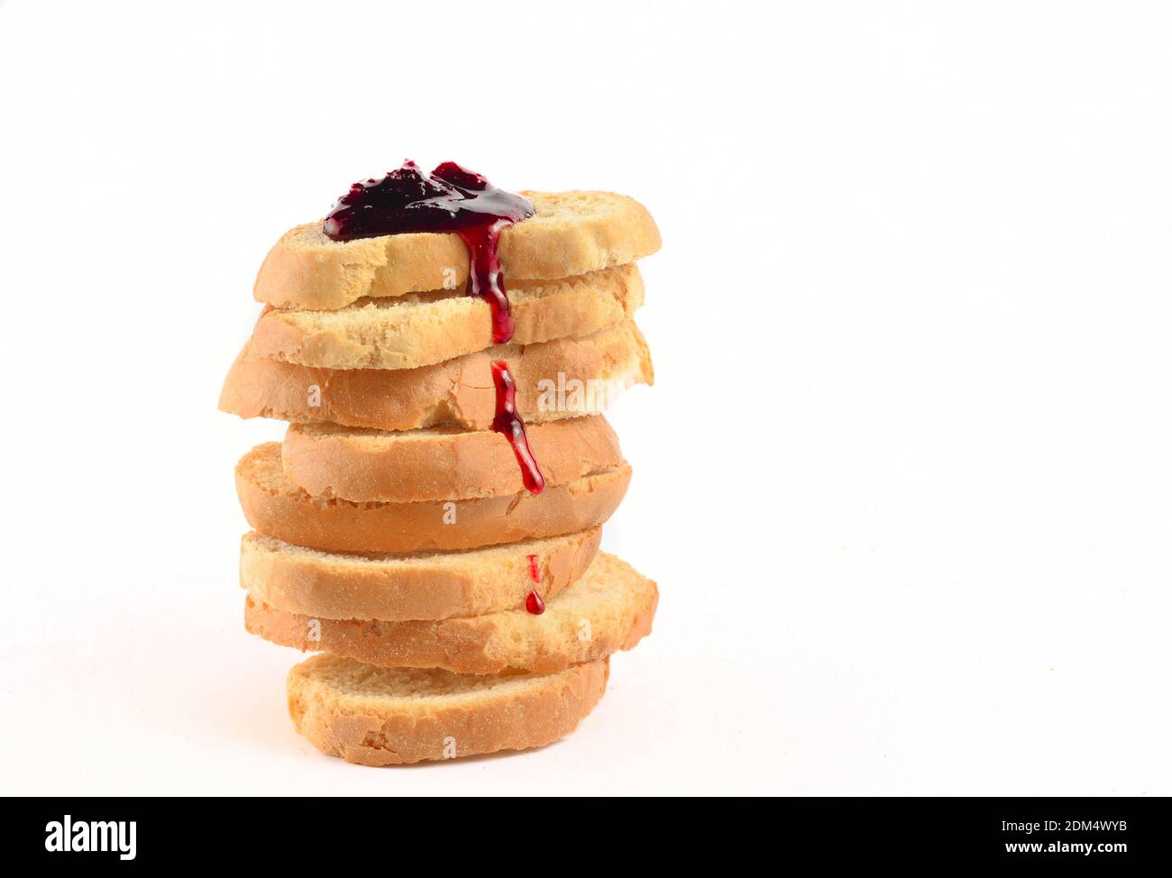 Stack of wheat rusks with jam isolated on white background Stock Photo ...