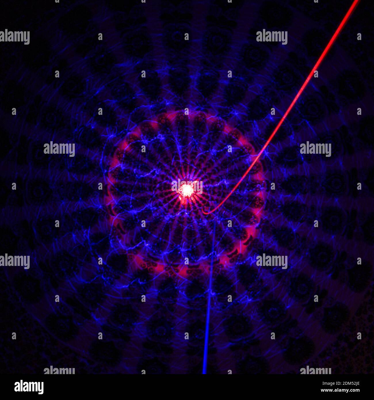 Mandala painted with colored light Stock Photo - Alamy