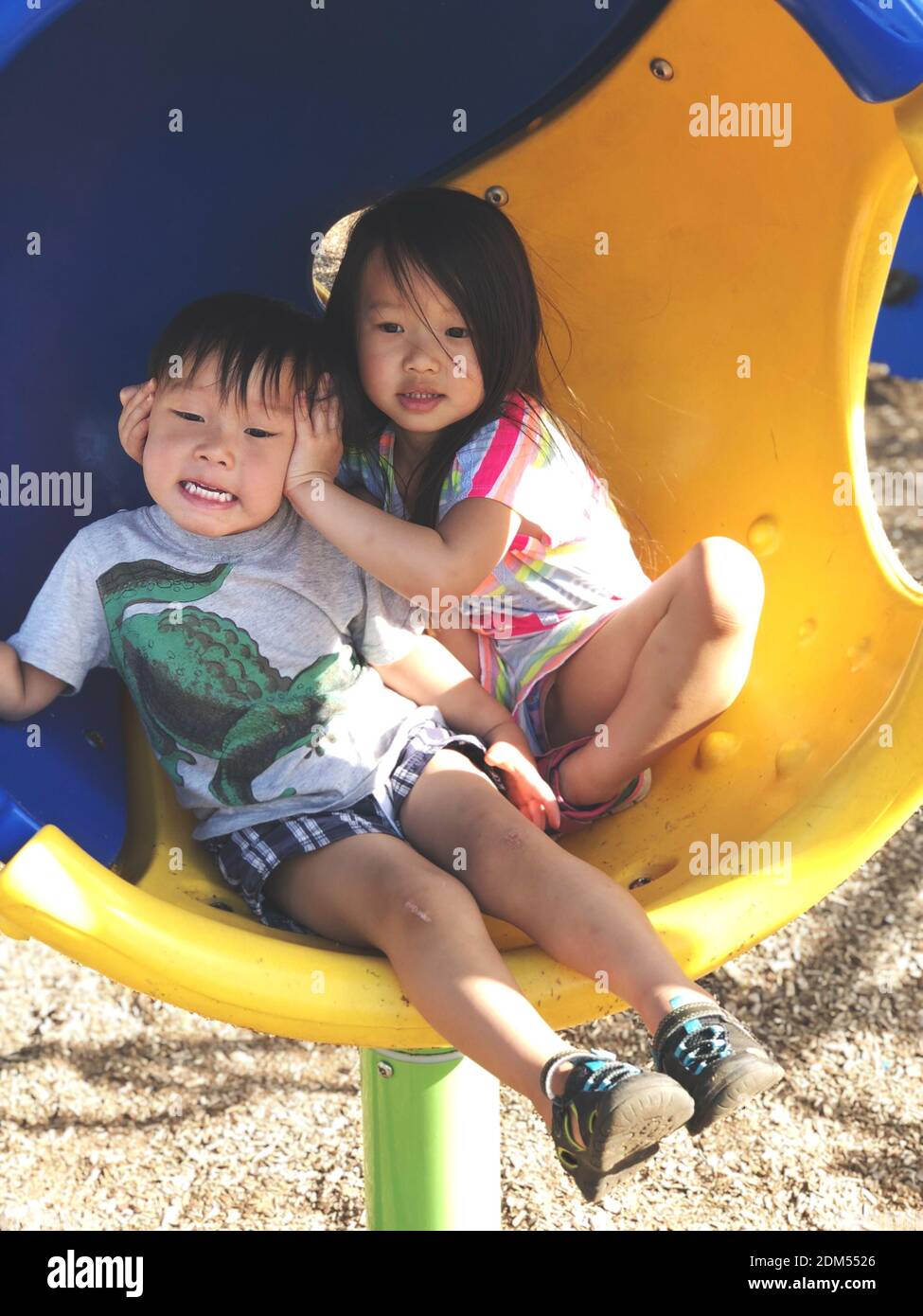 Boys 2 3 4 5 playing playground hi-res stock photography and images - Alamy