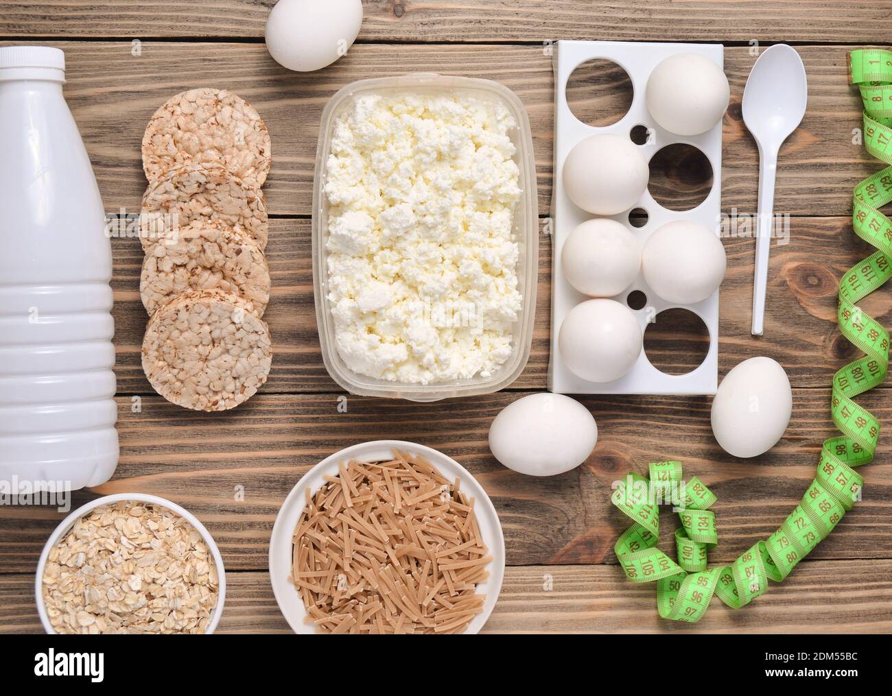 Diet, healthy food. Bottle of yogurt, crispy round bread, buckwheat ...