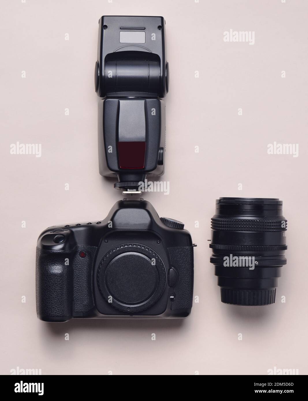 Equipment of the photographer. Digital camera, flash, lens. Top view ...
