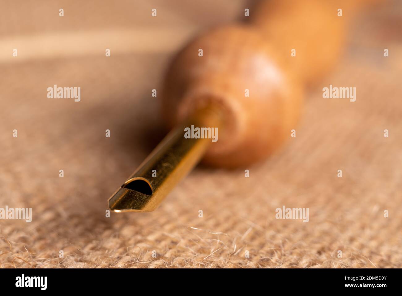 Flat lay composition of punch needle tools on a concrete surface in ...