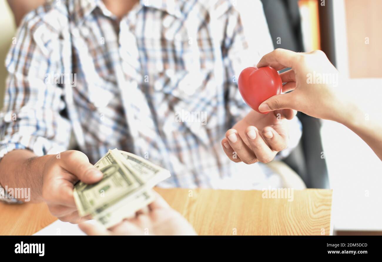 Friend giving money hi-res stock photography and images - Alamy