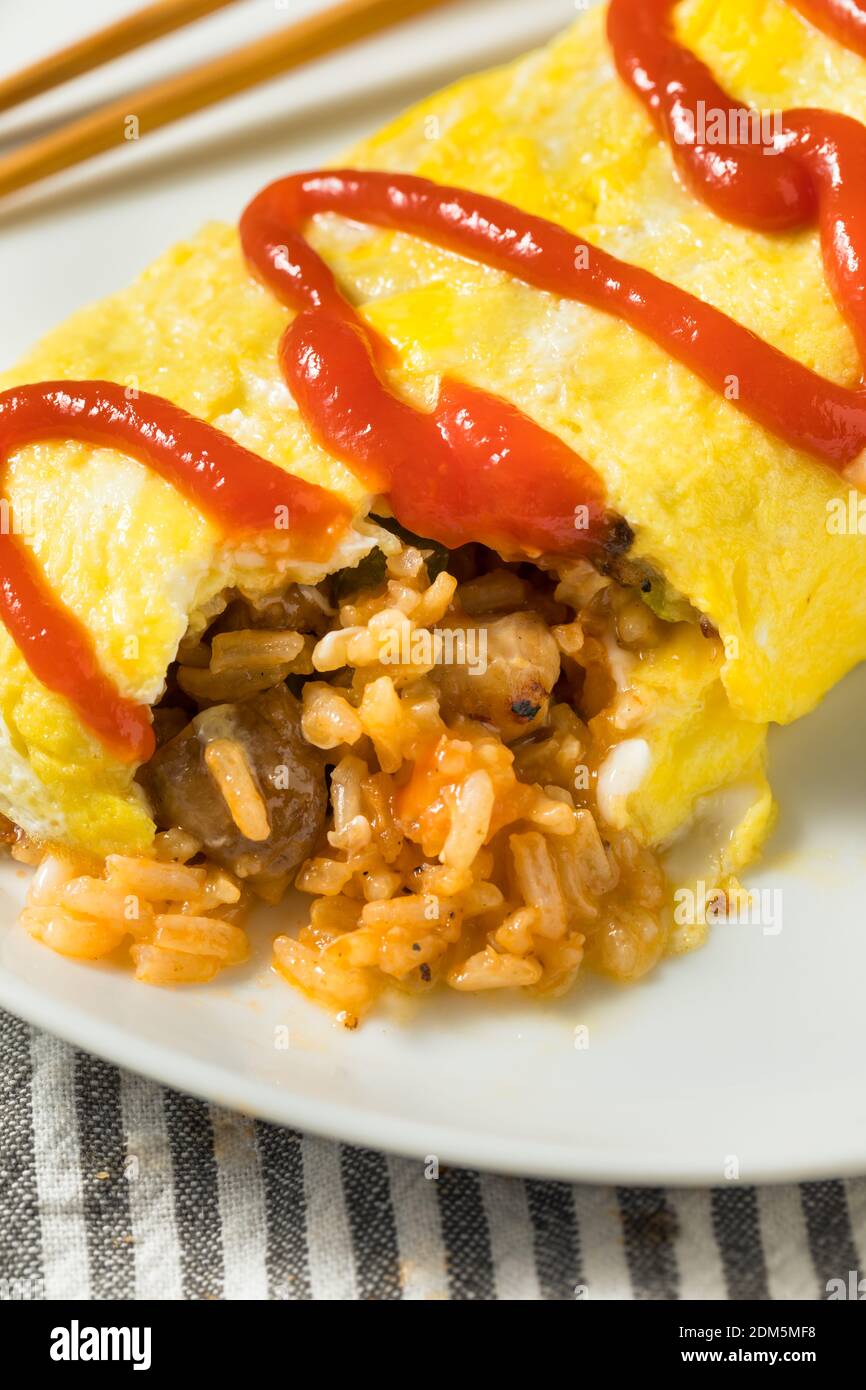 Homemade Japanese Omurice Rice Omelet with Ketchup Stock Photo - Alamy