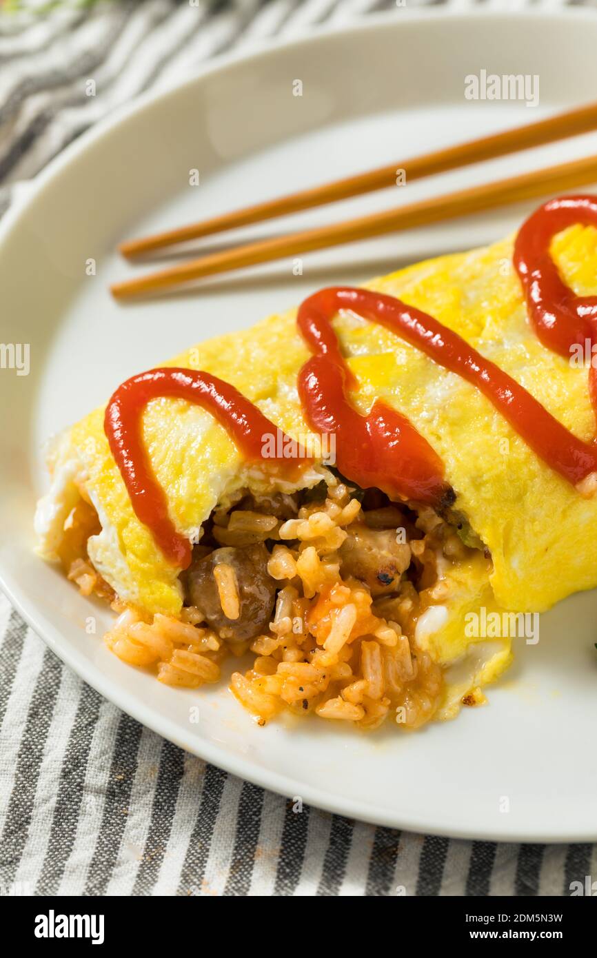 Homemade Japanese Omurice Rice Omelet with Ketchup Stock Photo - Alamy