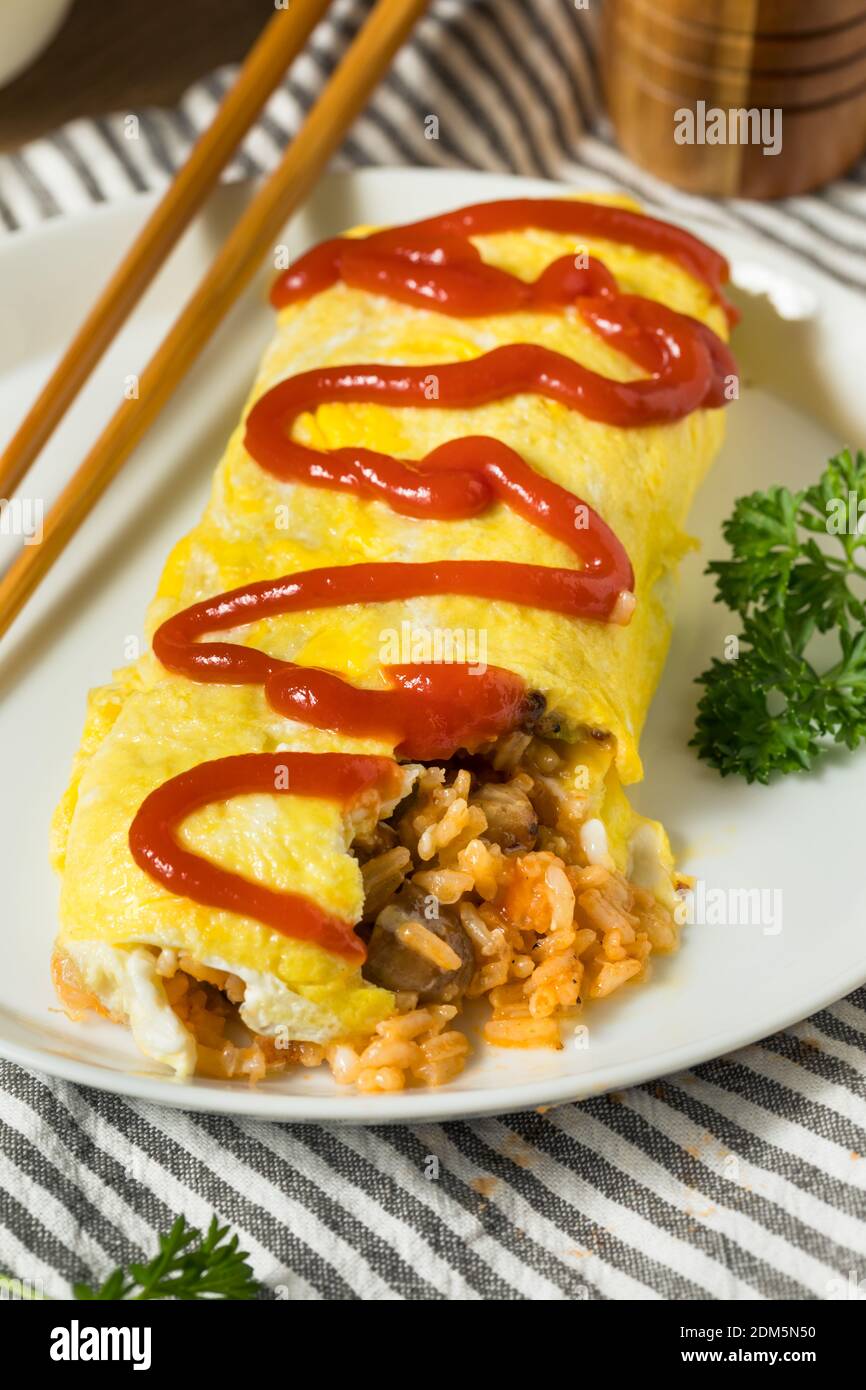 Homemade Japanese Omurice Rice Omelet with Ketchup Stock Photo - Alamy