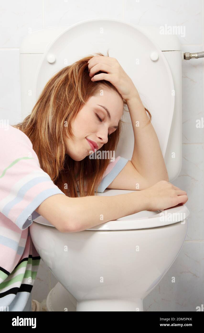Person with head in toilet bowl hi-res stock photography and images - Alamy