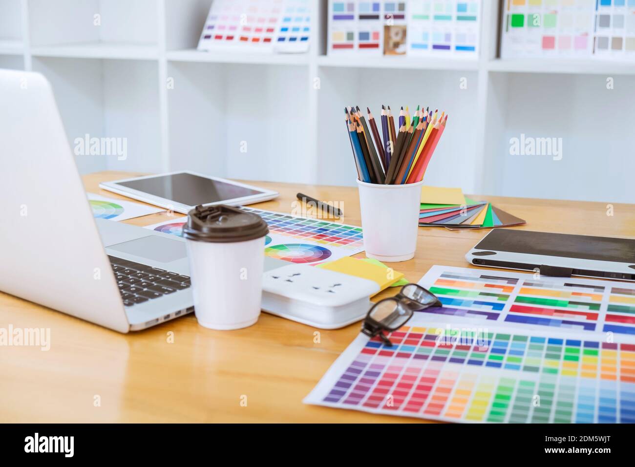 Desk with computer and swatch book hi-res stock photography and images ...