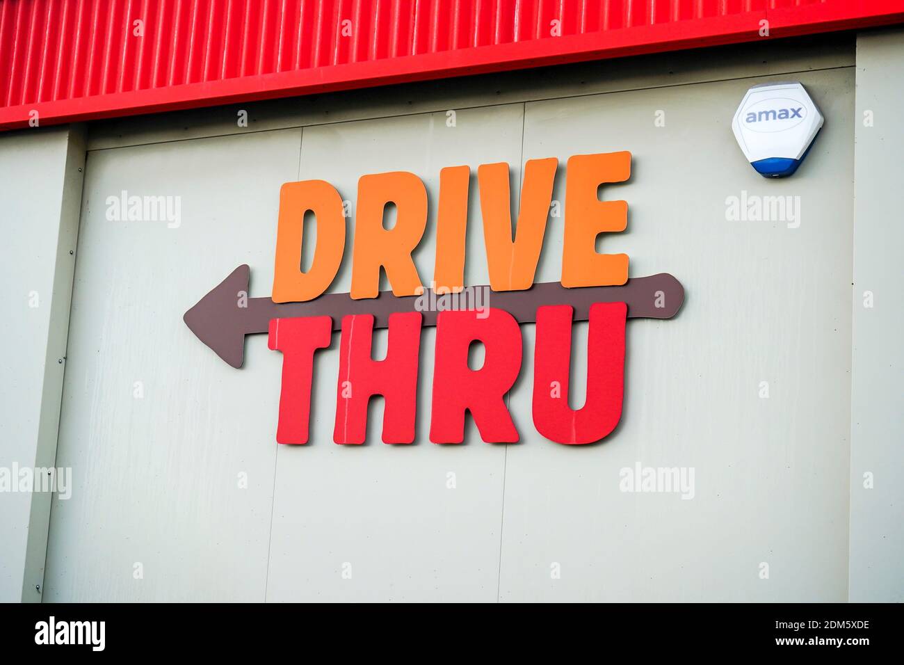 Drive Thru fast food restaurant sign isolated outdoors on UK building ...