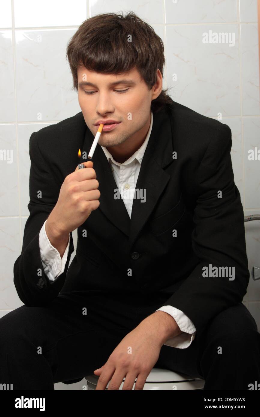 Smoking on toilet hi-res stock photography and images - Alamy