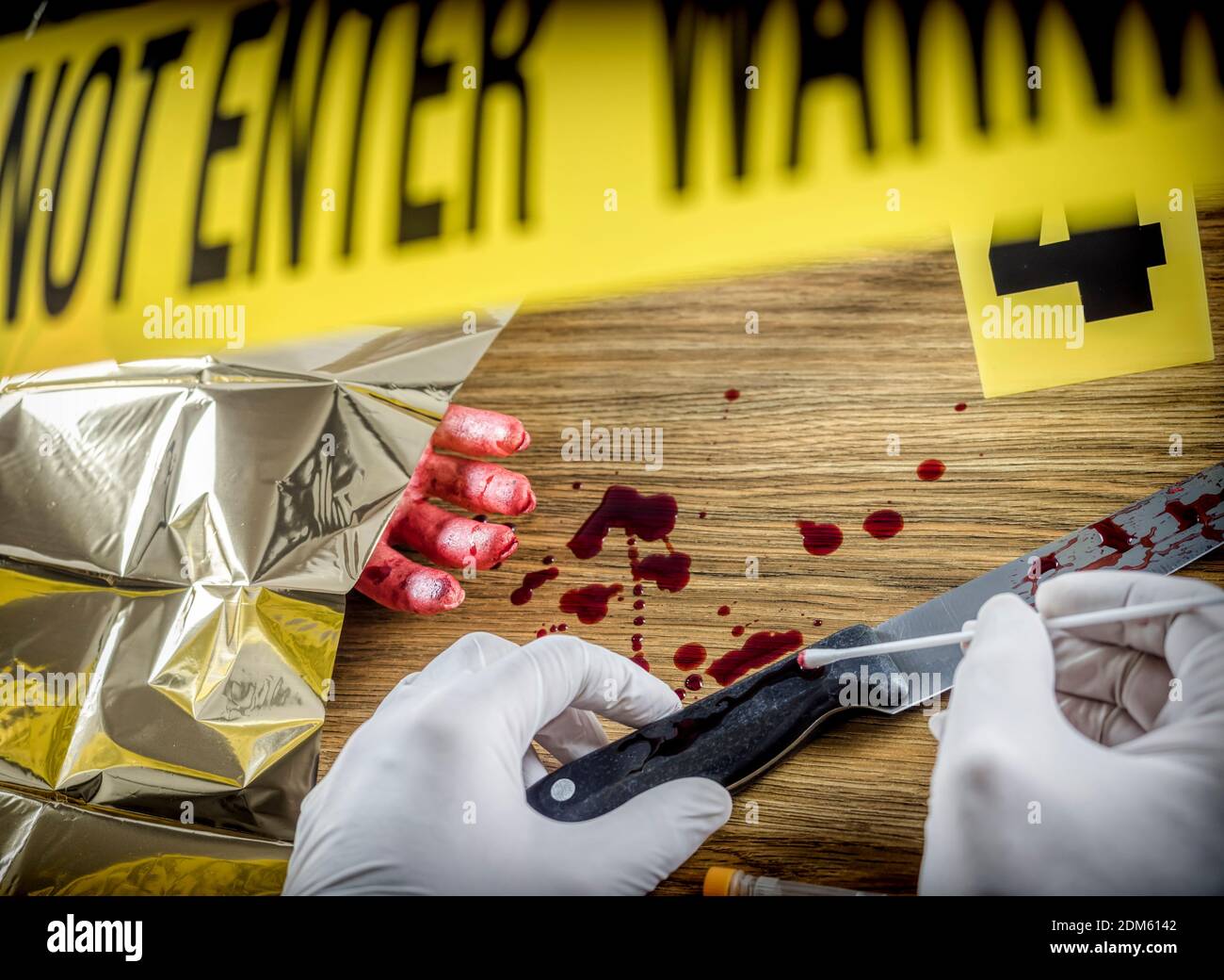 Crime scene tape hand hi-res stock photography and images - Alamy