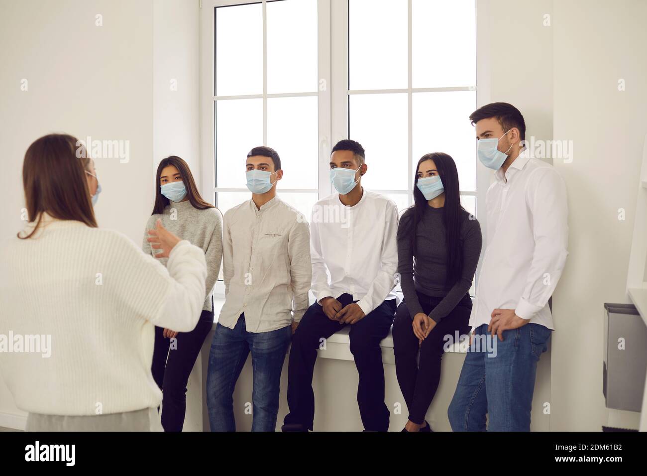 Diverse women listen speech hi-res stock photography and images - Alamy