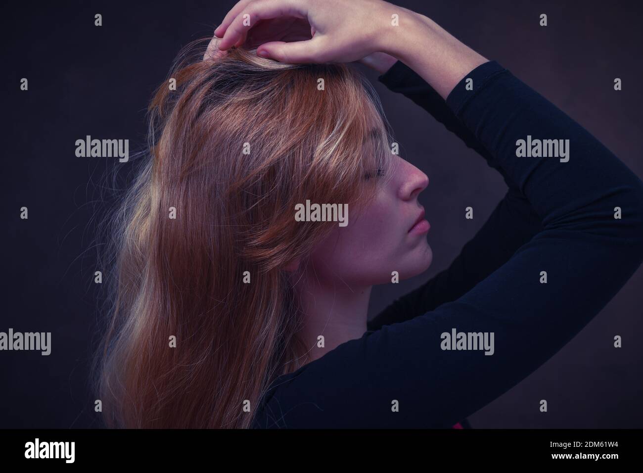 Young naturally beautiful women (age 20 )with long blonde hair side ...