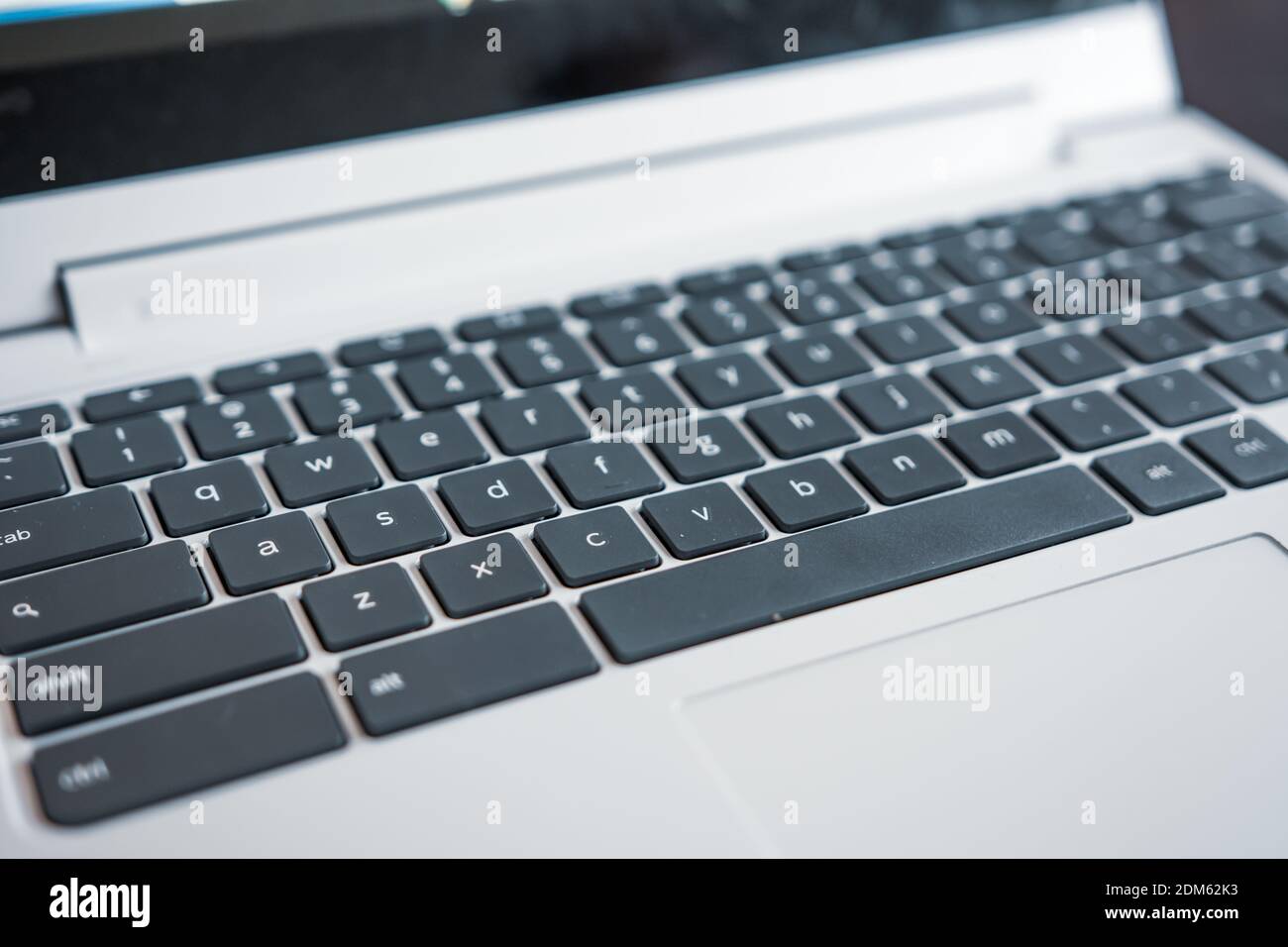 Black and white qwerty keyboard on modern laptop computer Stock Photo ...