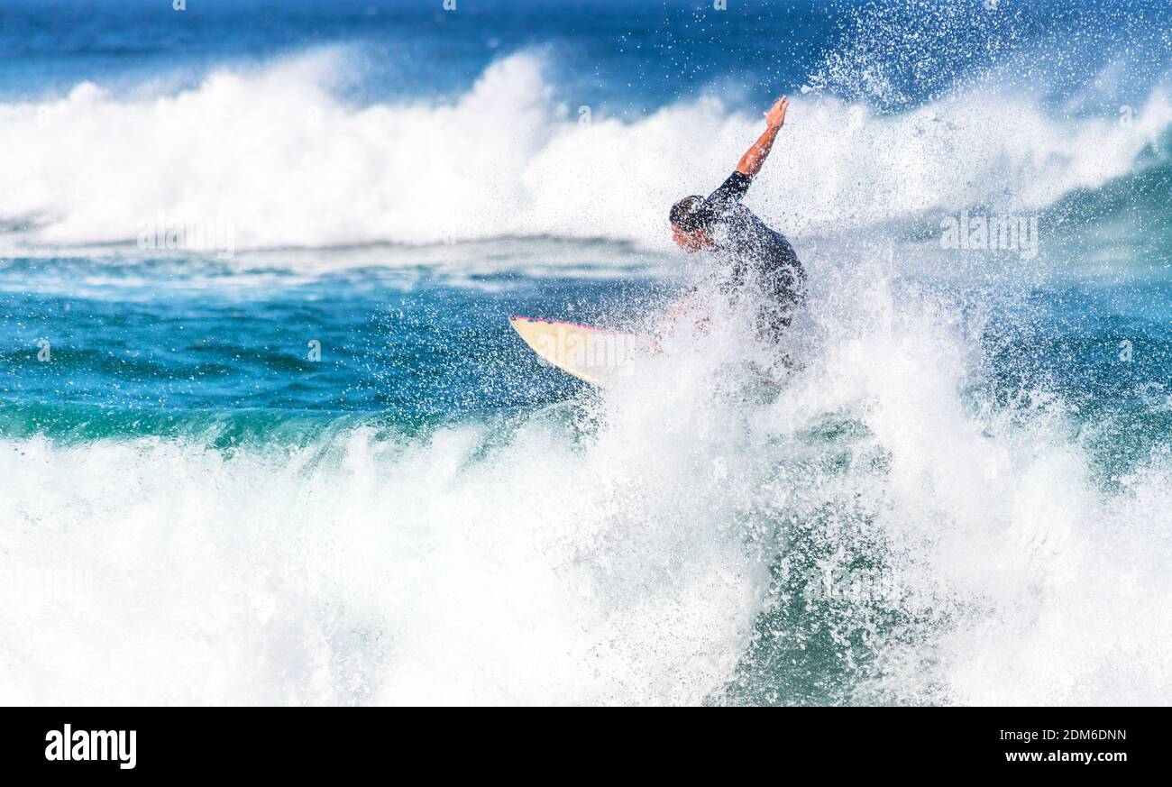 Male surfer in wavy hi-res stock photography and images - Alamy