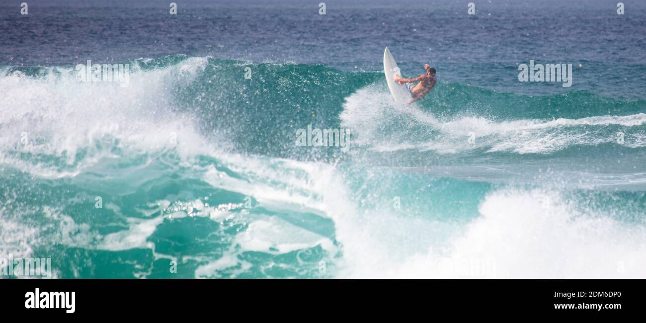 Male surfer in wavy hi-res stock photography and images - Alamy