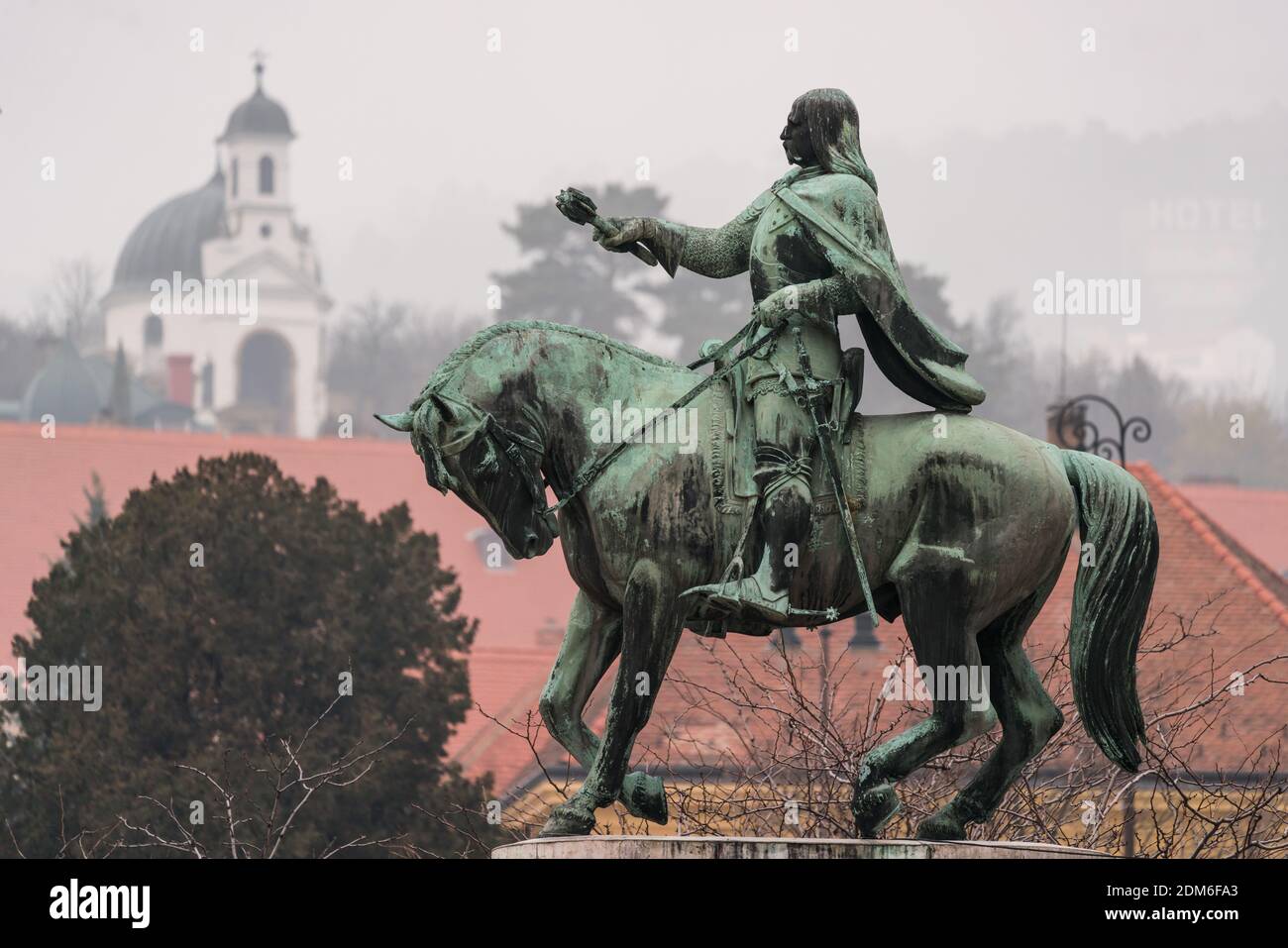 statue of Janos Hunyadi on Szechenyi Square in Pecs, Hungary with ...