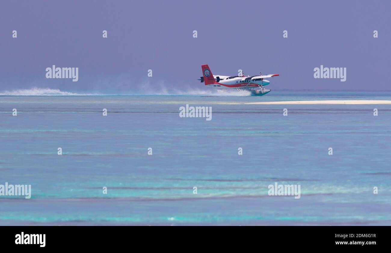 A seaplane takeoff in the blue sea Stock Photo - Alamy